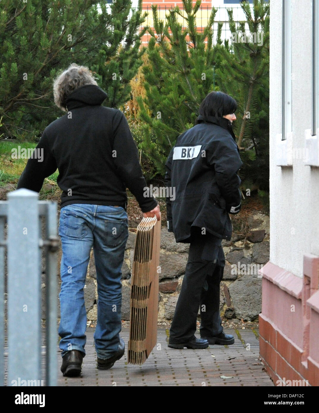 Officers of the Federal Criminal Police Office (BKA) carry packing ...