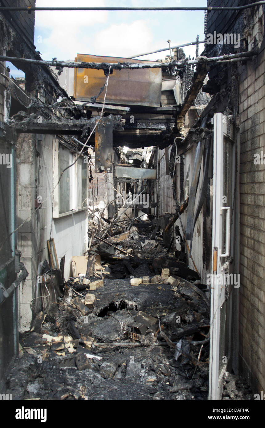 The charred remains of the classrooms and its teaching equipment are ...