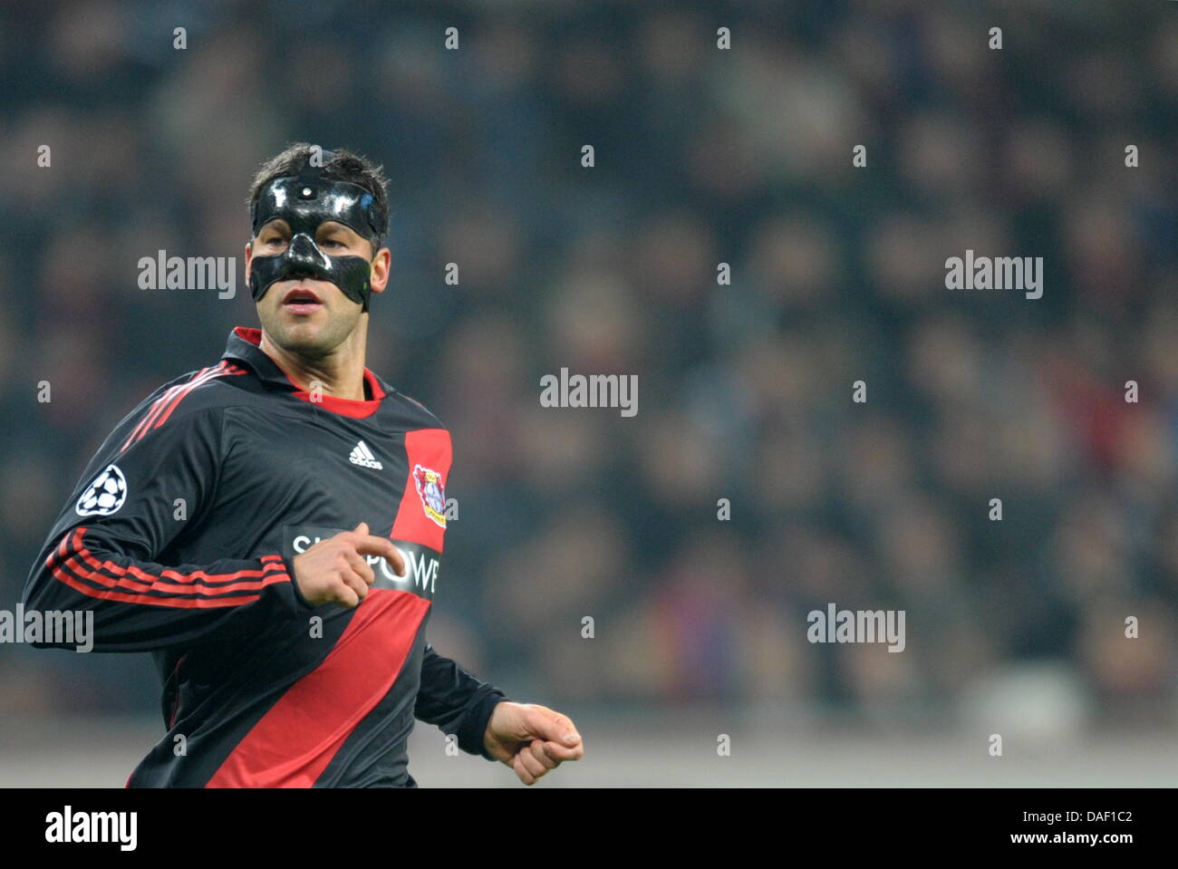 Leverkusen's Michael Ballack wears a protective mask due to a broke ...