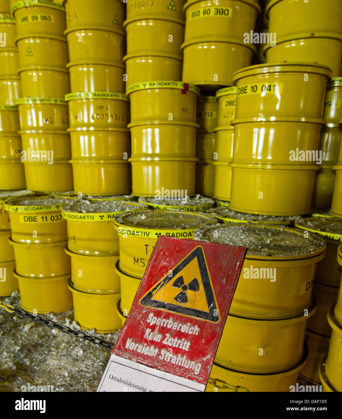 Stacks of yellow barrels stand in the 500 metre deep underground ...