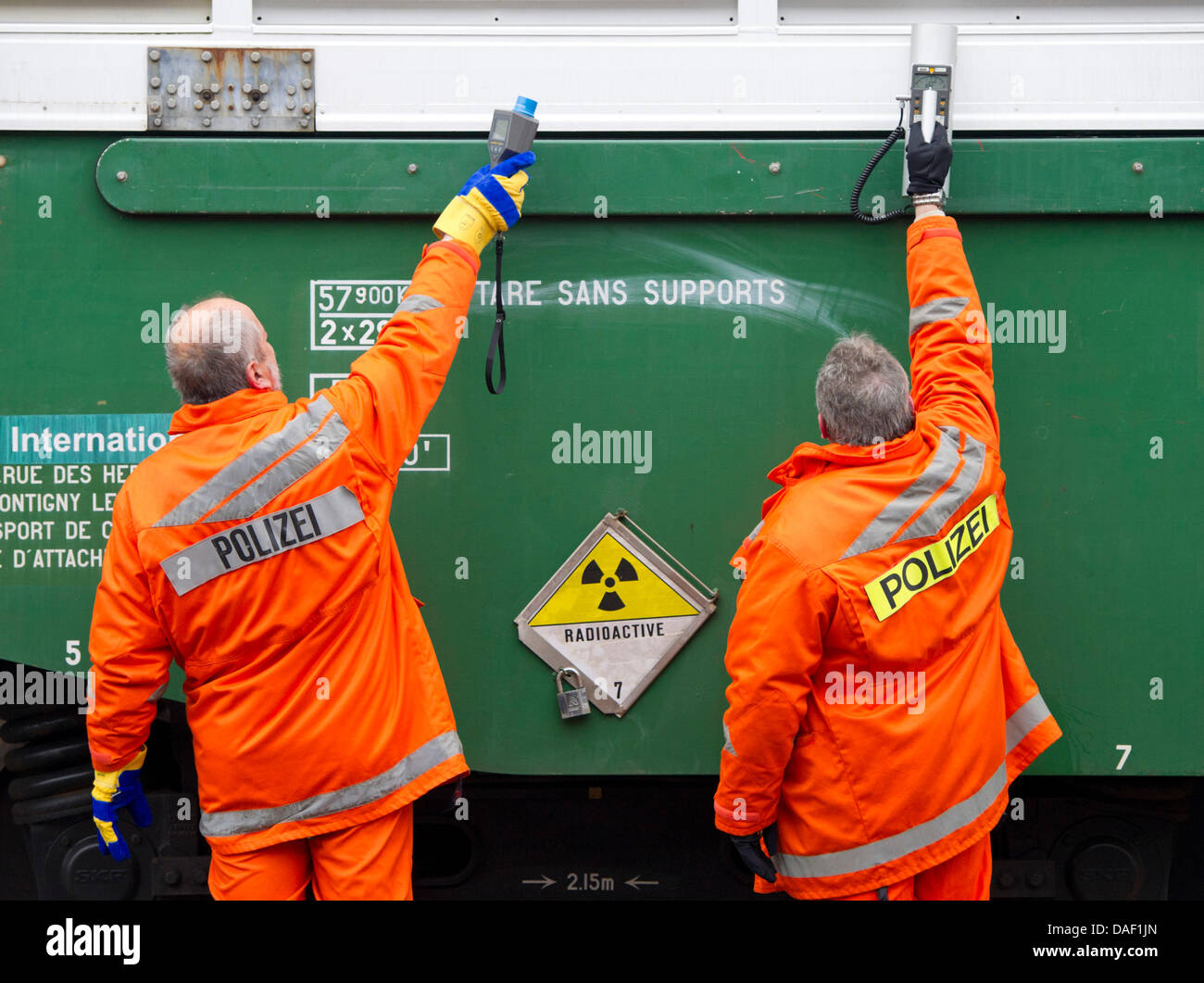 A police radiation measuring squad checks the radiation from a CASTOR ...