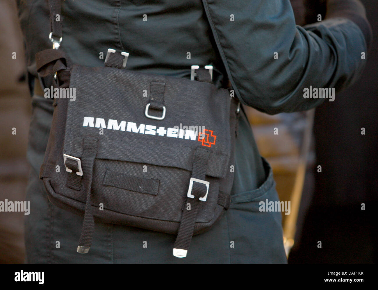 A female fan wears a bag with the Rammstein logo in front of the O2 ...