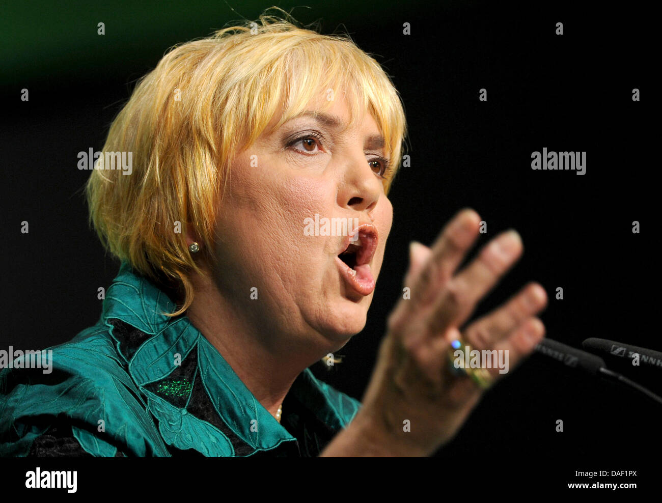 Chairwoman of the Green Party, Claudia Roth, delivers a speech on stage ...