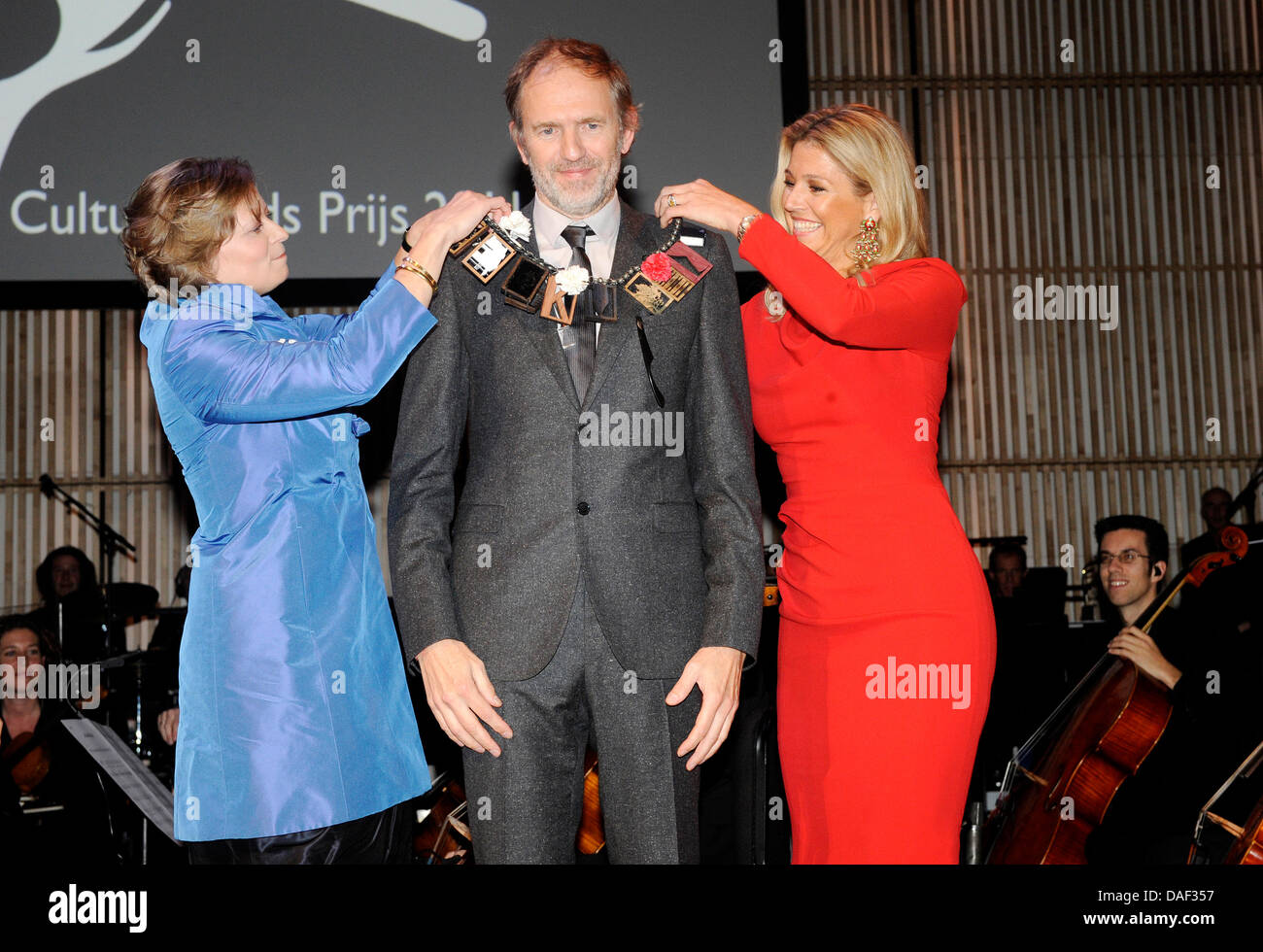 Dutch Princess Maxima (R) honores Dutch photographer and filmmaker ...