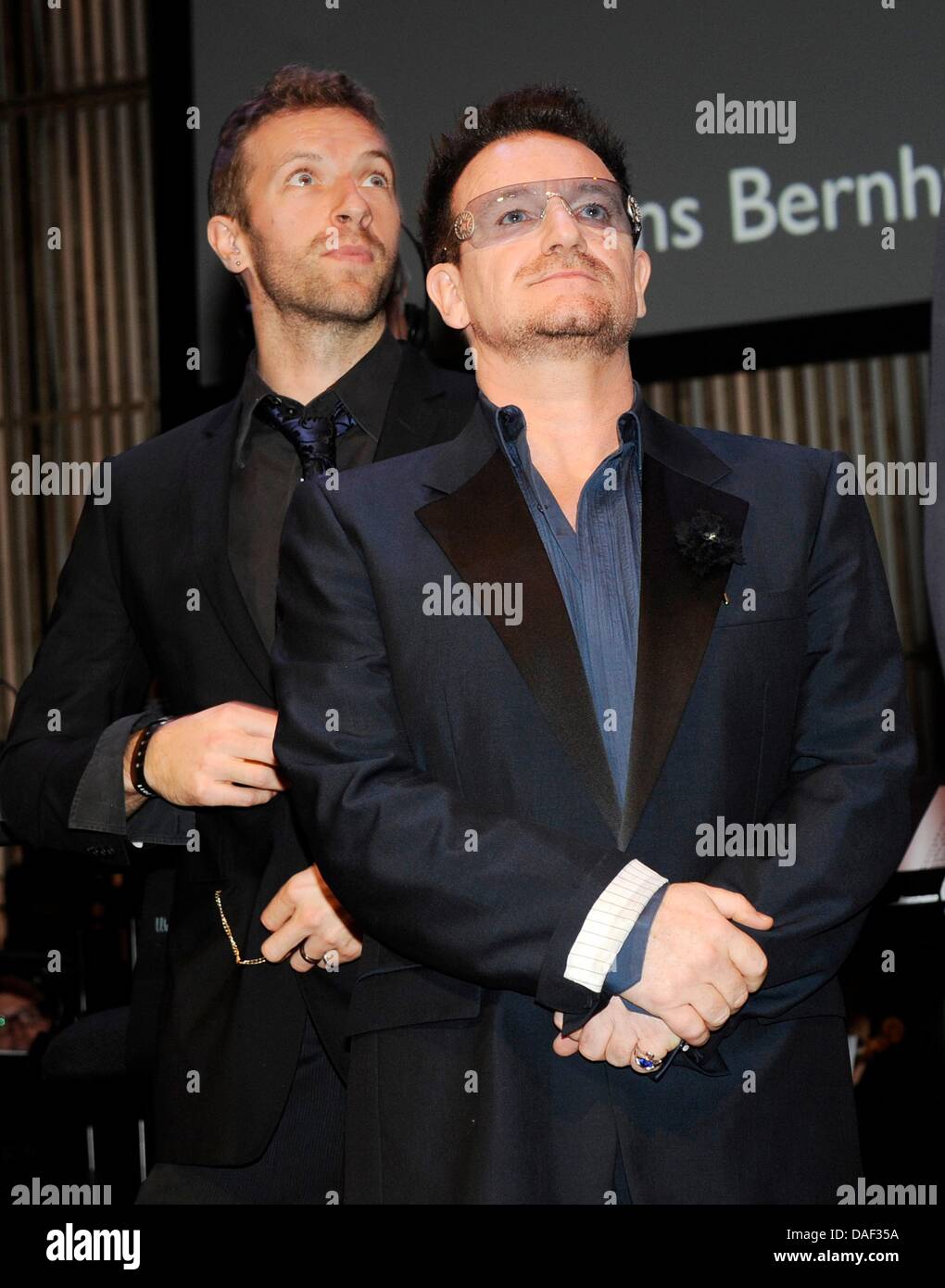 Chris Martin (L) of British band Coldplay and Irish singer Bono of the ...