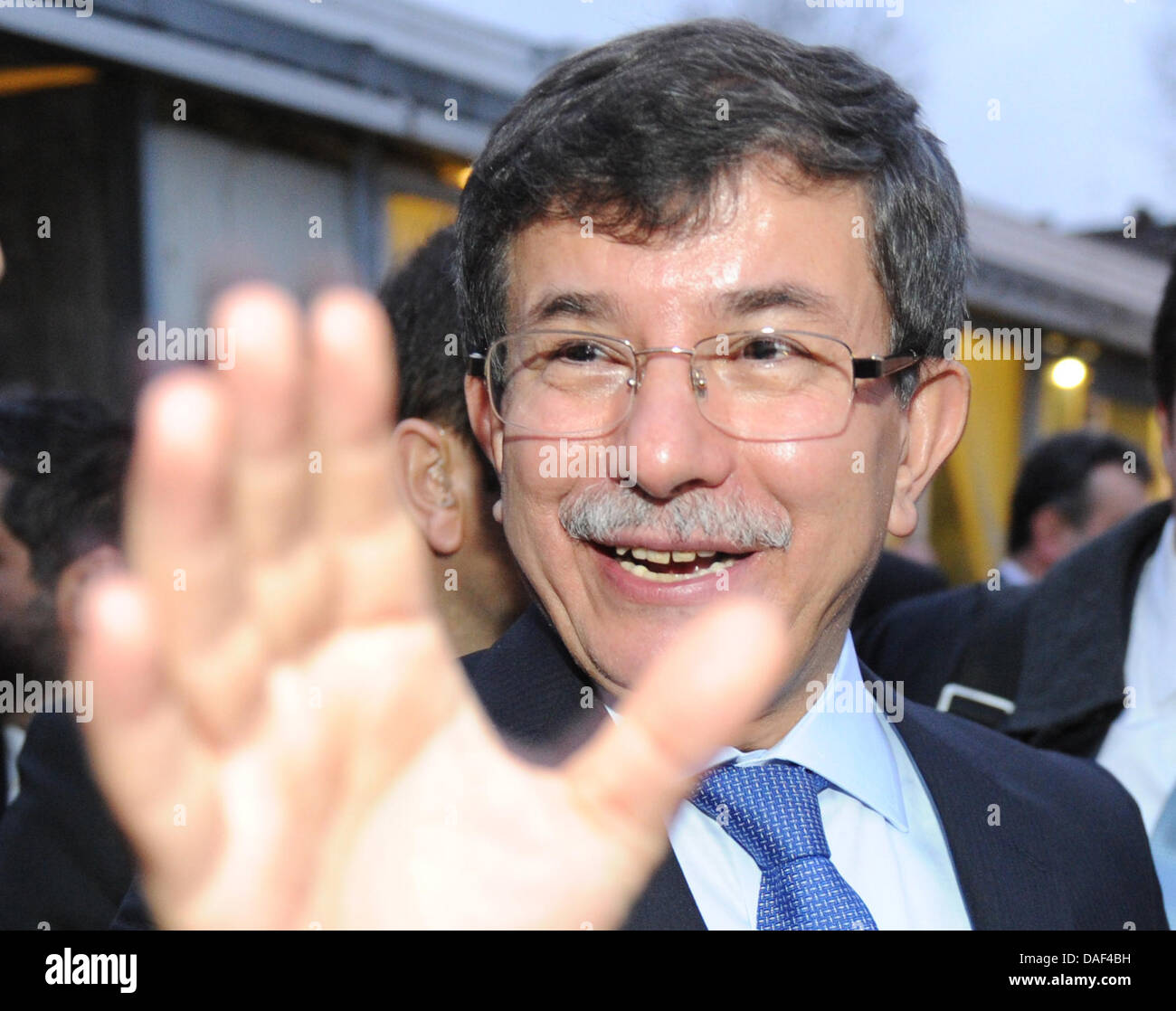 The Turkish Foreign Minister Ahmet Davutoglu meets members of the ...