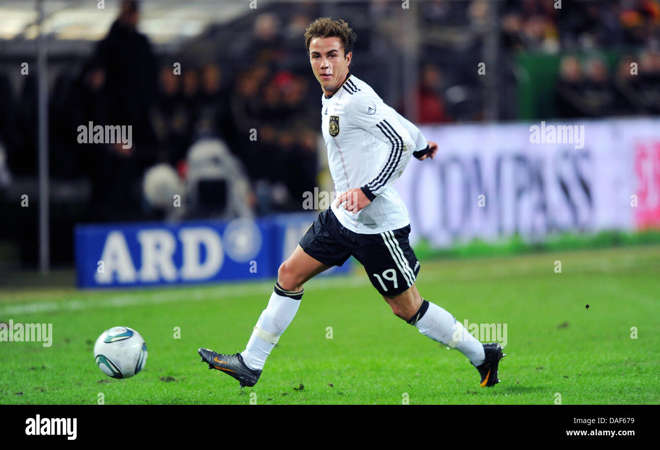 German player Mario Goetze controls the ball during the friendly soccer ...