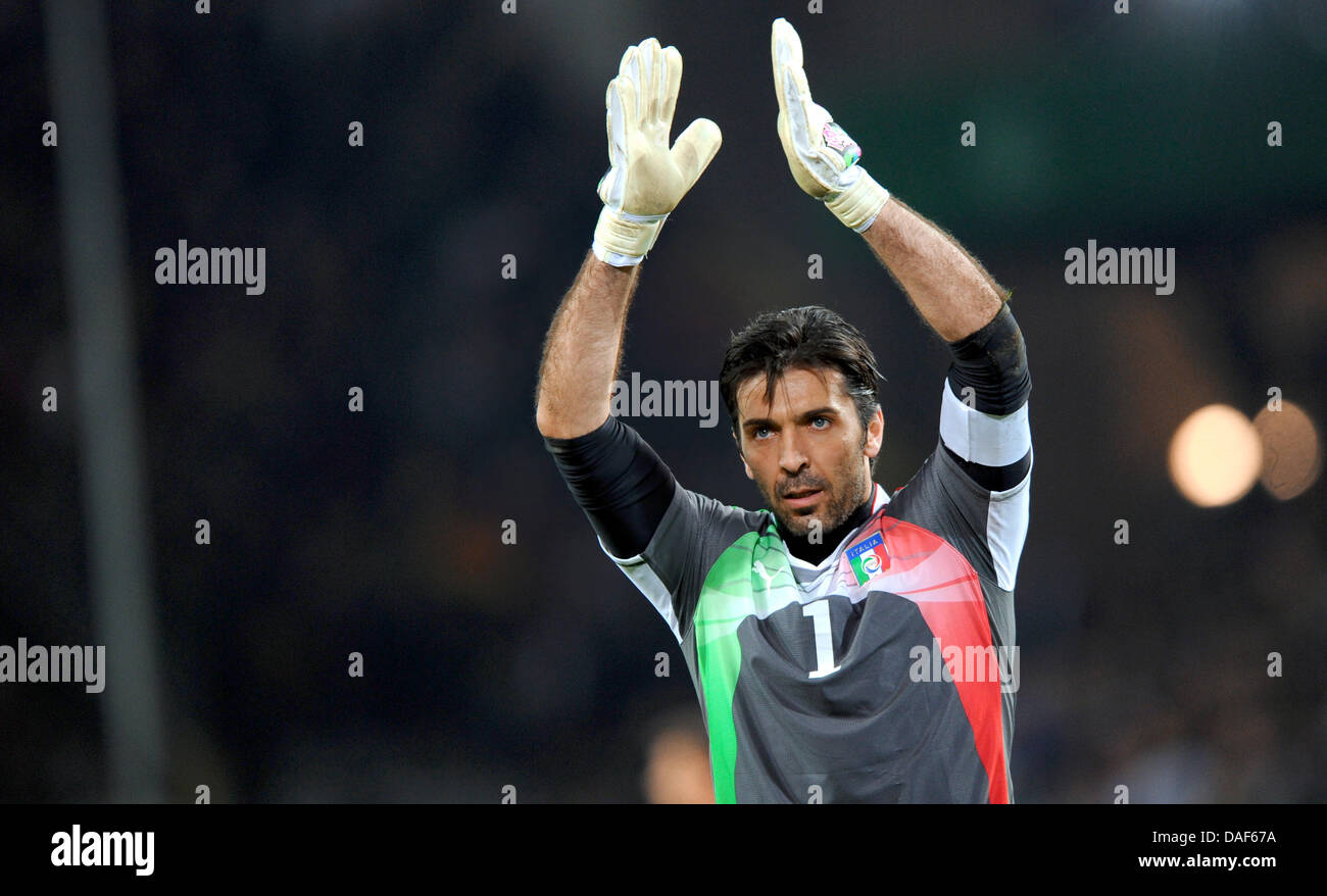 Italian goalkeeper Gianluigi Buffon cheers after the friendly soccer ...