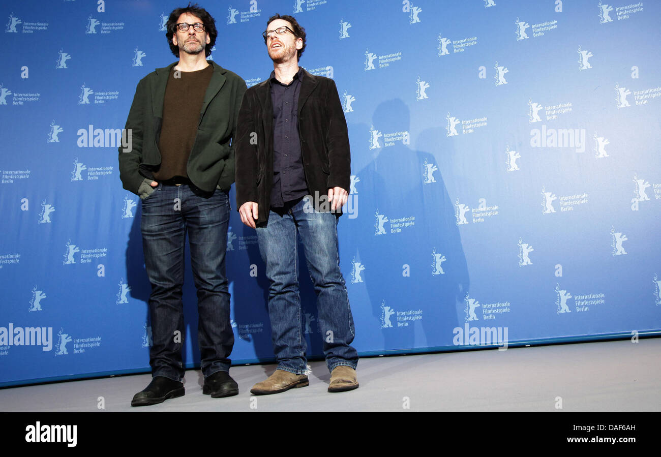 US directors Joel (L) and Ethan Coen pose during a photo call for the film 'True Grit' during ...
