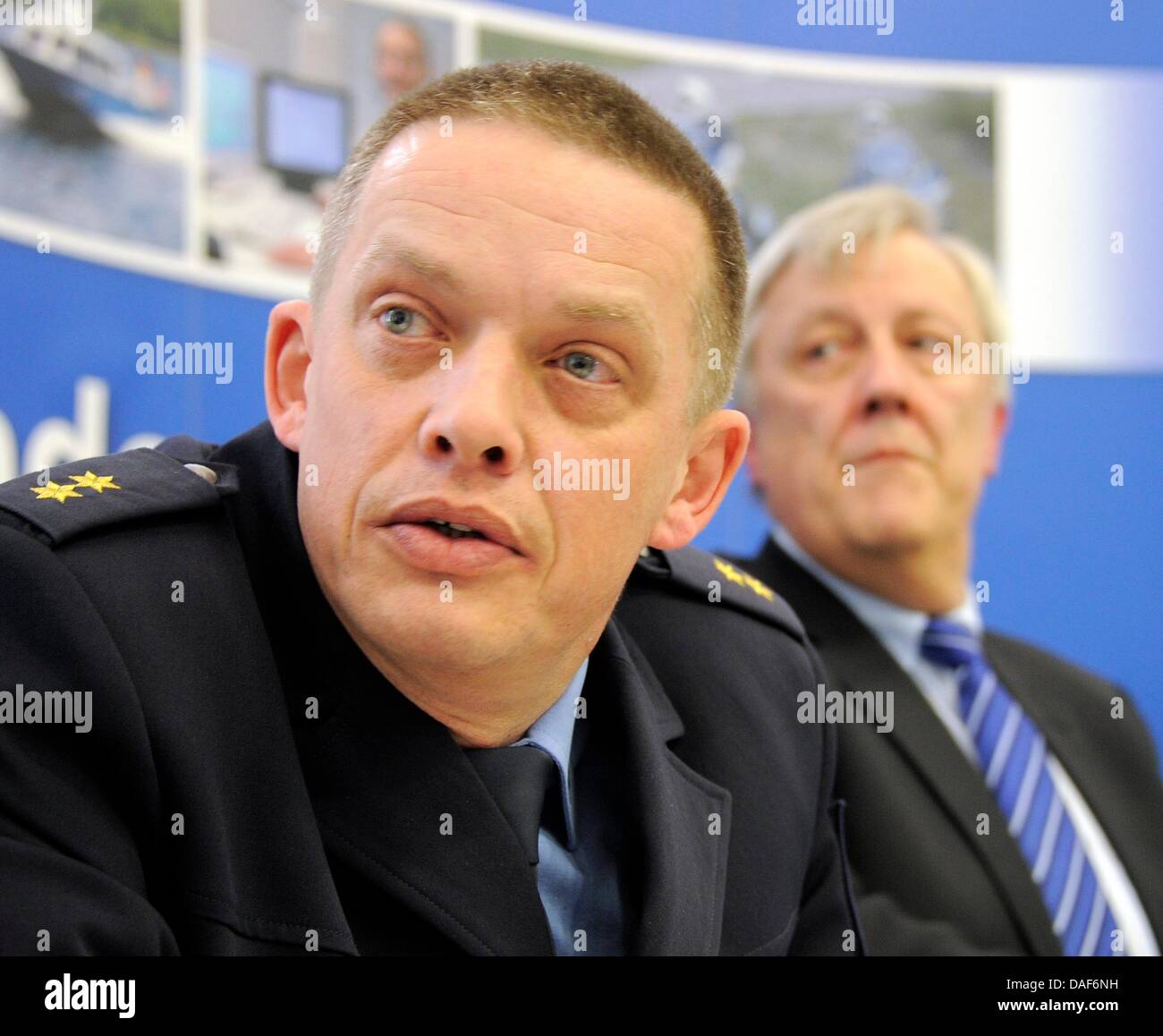 Police Commander Uwe Flemming (L), Chief of Police Rainer Kahn (R ...