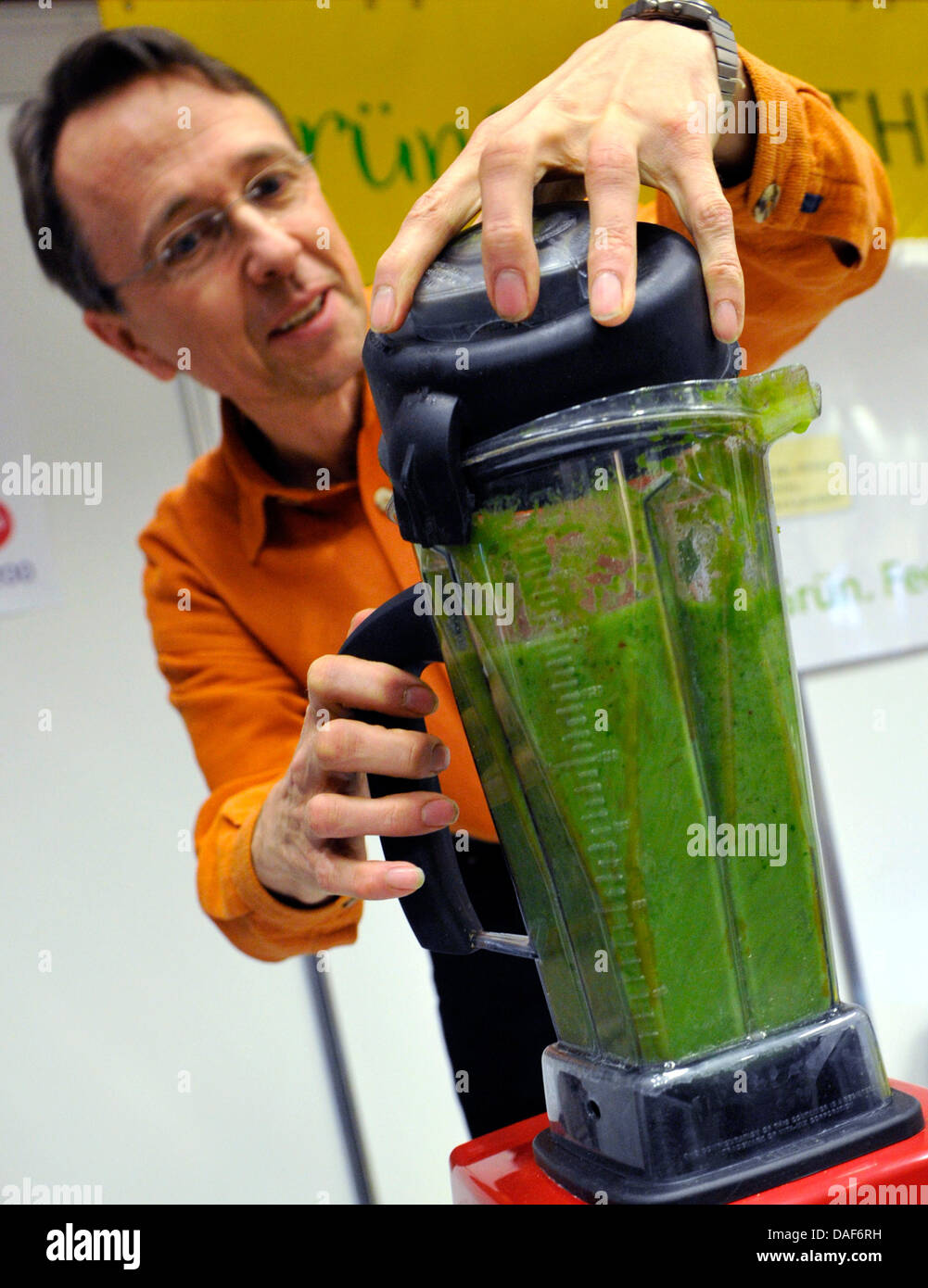 Exhibitor Burckhard Hickish mixing a smoothie at the fair 'Veggie World ...