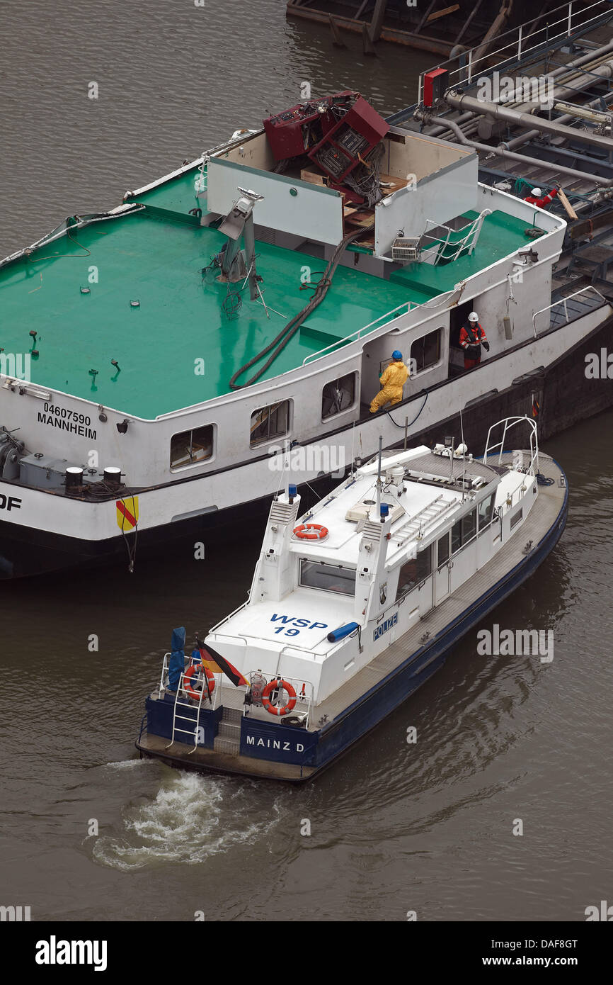 Rescue forcers raise the capsized acid barge near St Goatrshausen ...