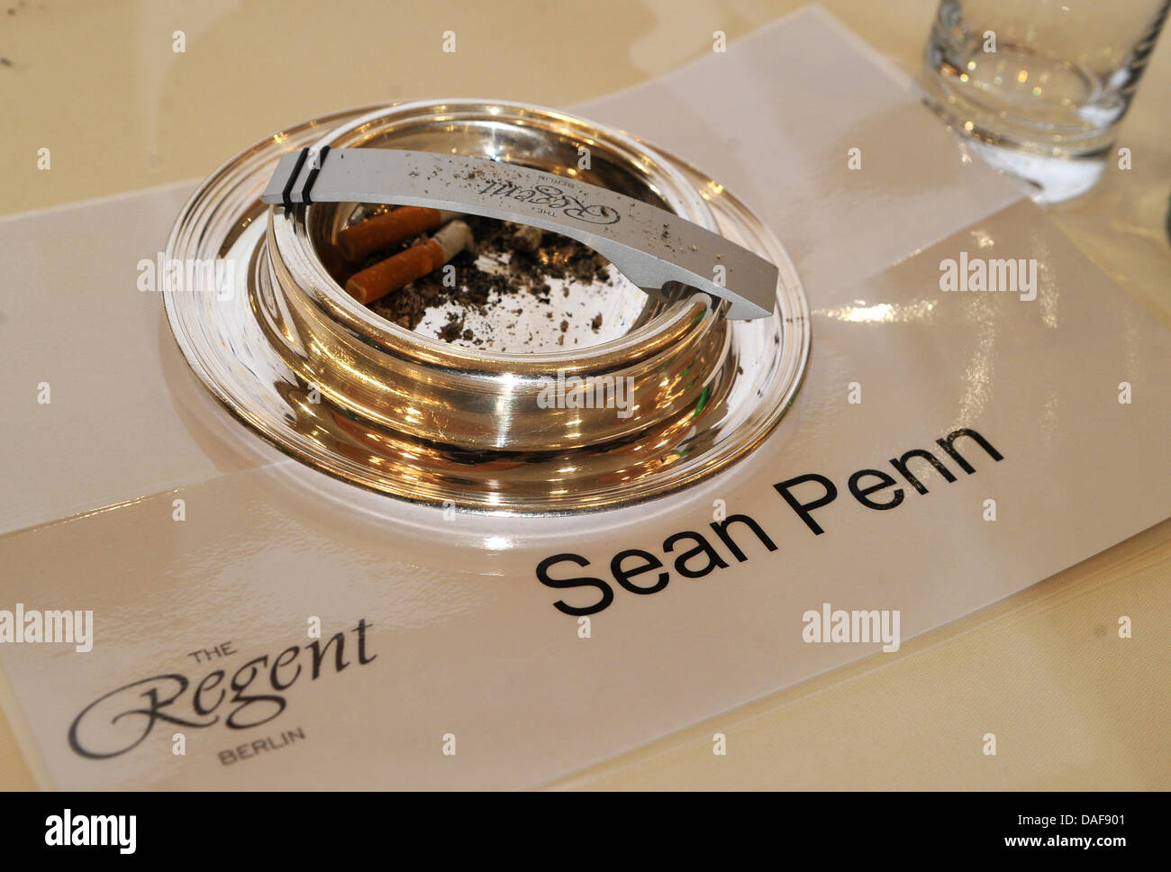 An ashtray stands on the seat of US actor Sean Penn (unseen) prior to ...