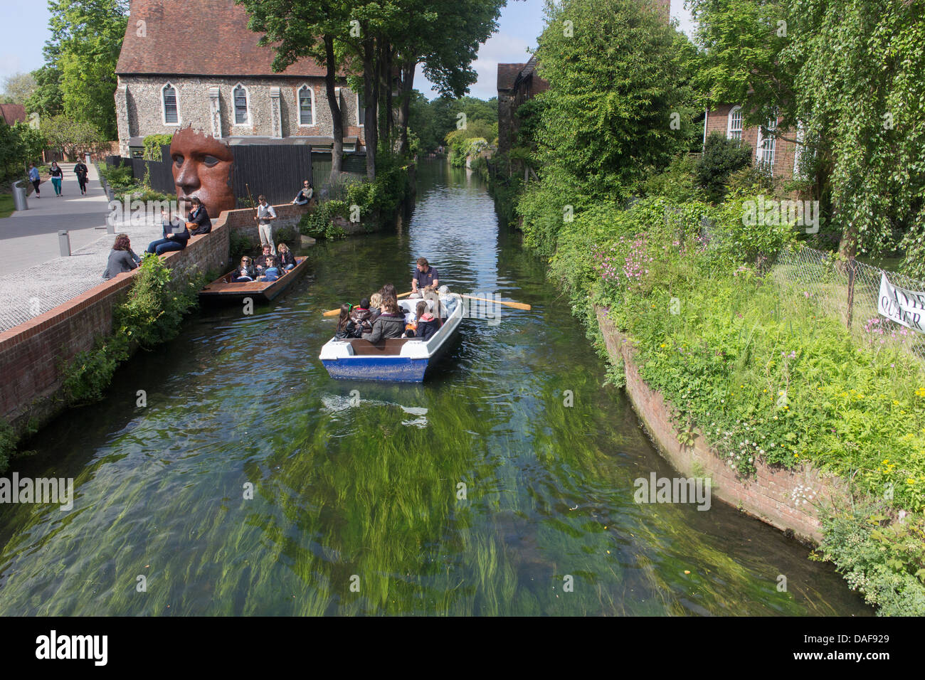 Rowing boat and punt on River Stour by theatre, Canterbury Stock Photo ...