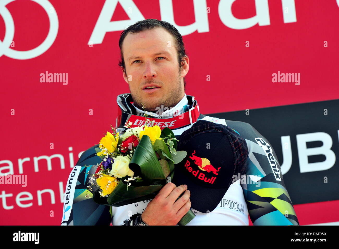 Aksel Lund Svindal of Norway celebrates on the podium after winning the ...