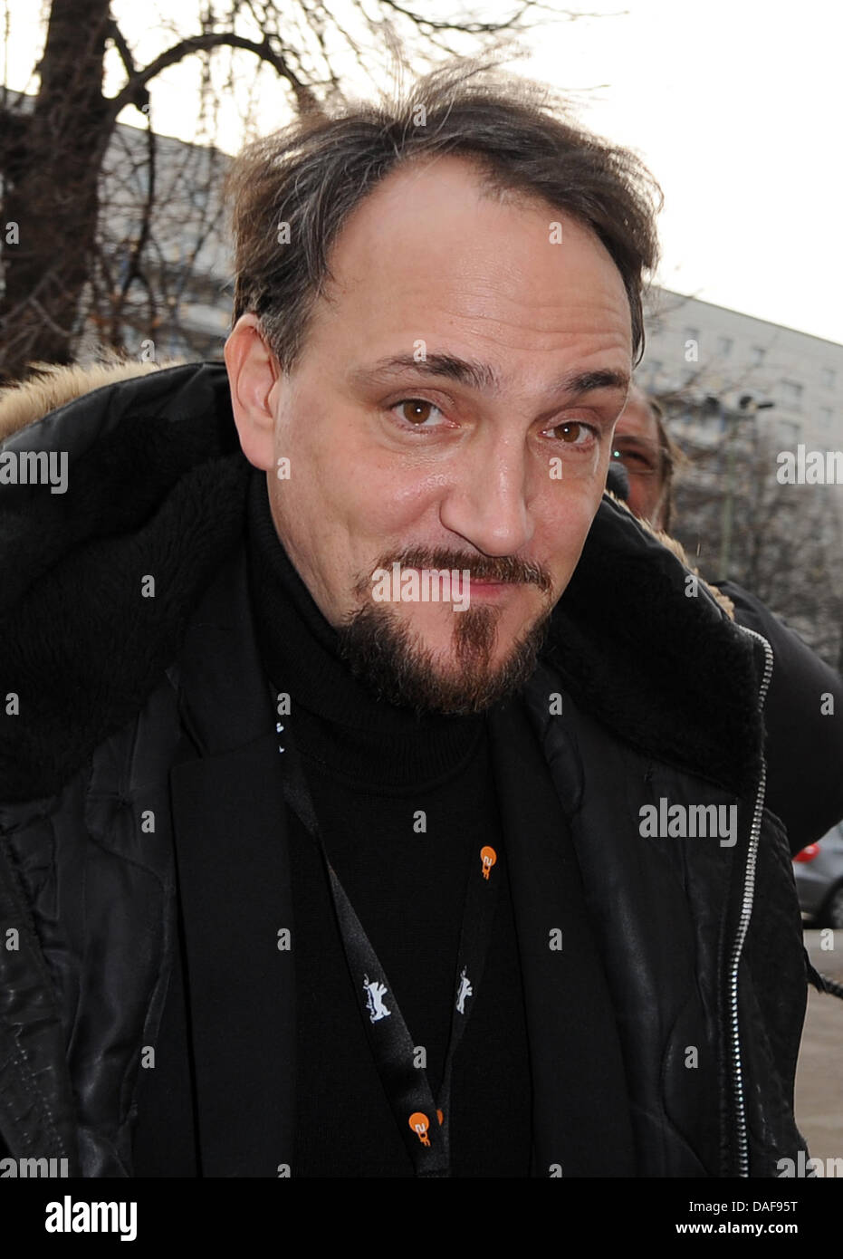 Russian director Cyril Tuschi (L) arrives for the premiere of his film ...