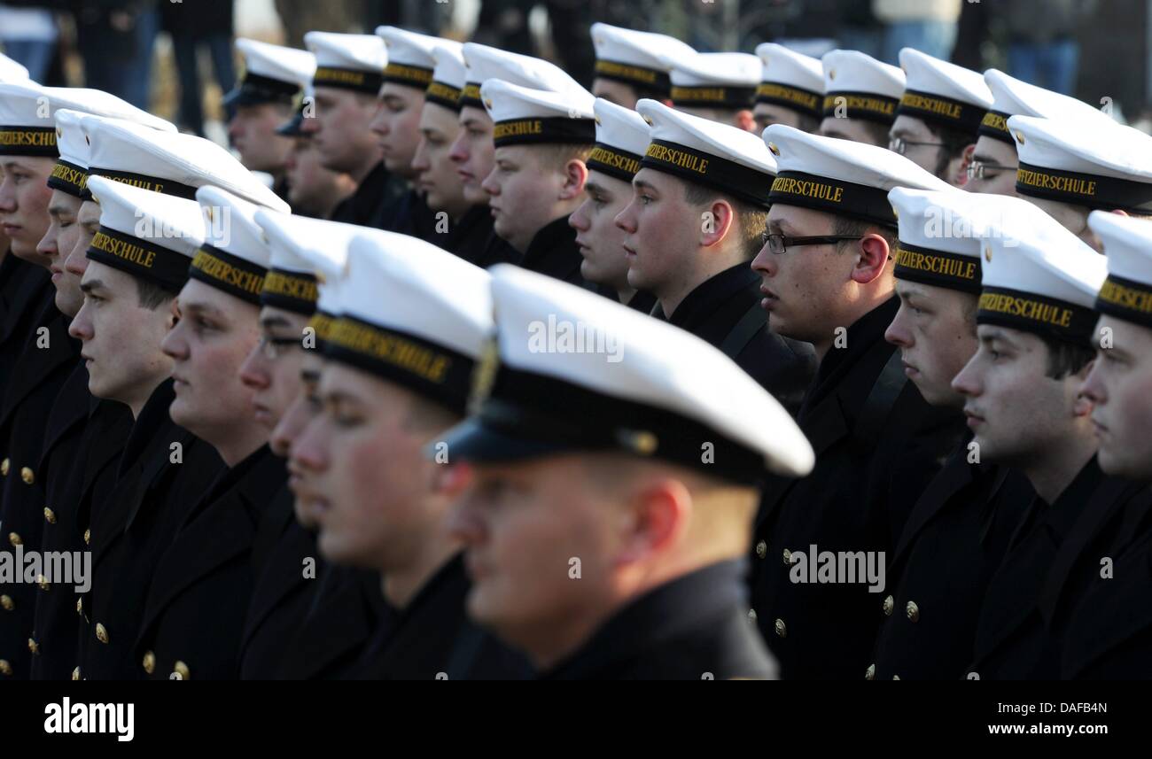 Young marines stand next to each other during a solemn pledge at the ...