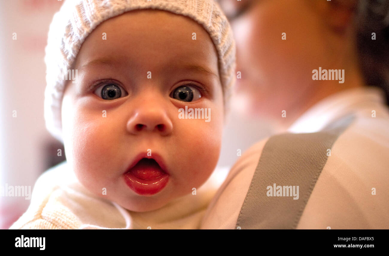 Five month old baby Helena poses with her mother Dorothea during a ...