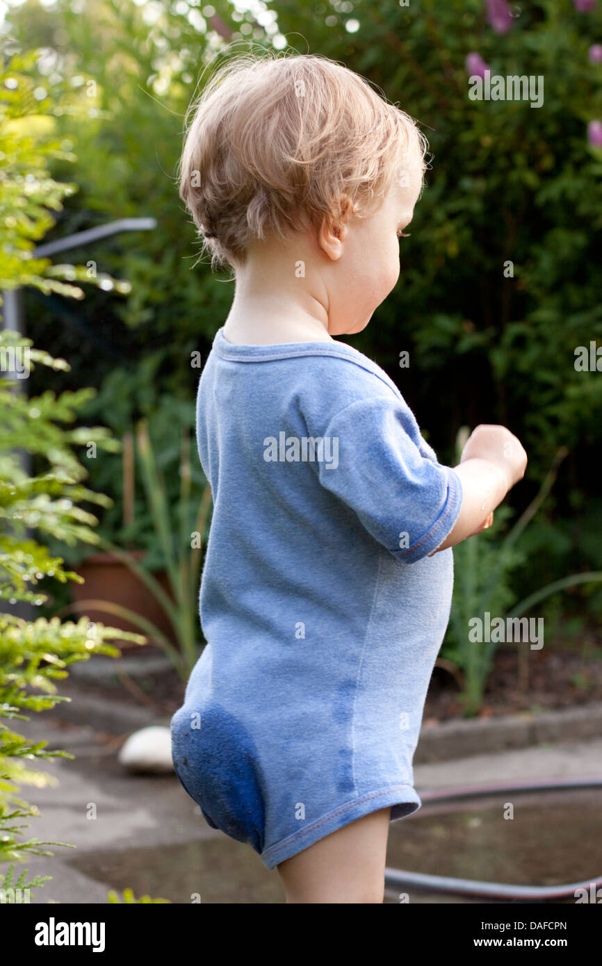 Germany Girl In Garden With Wet Butt Stock Photo Alamy