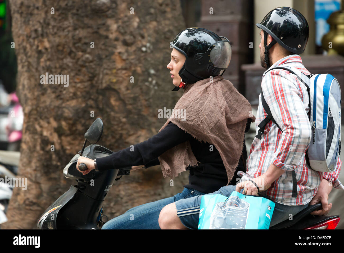 Scooter Drivers in Hanoi, Vietnam Stock Photo - Alamy