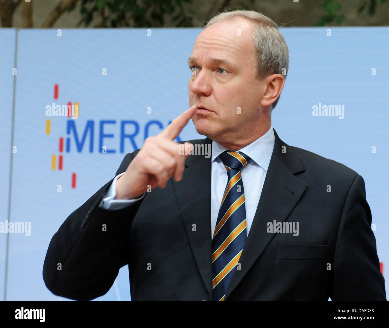 Merck CEO Karl-Ludwig Kley gestures during the balance press conference ...