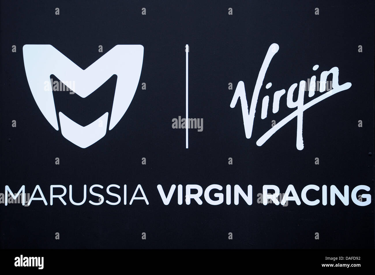 The logo of Marussia Virgin Racing during test drives on Circuit de ...