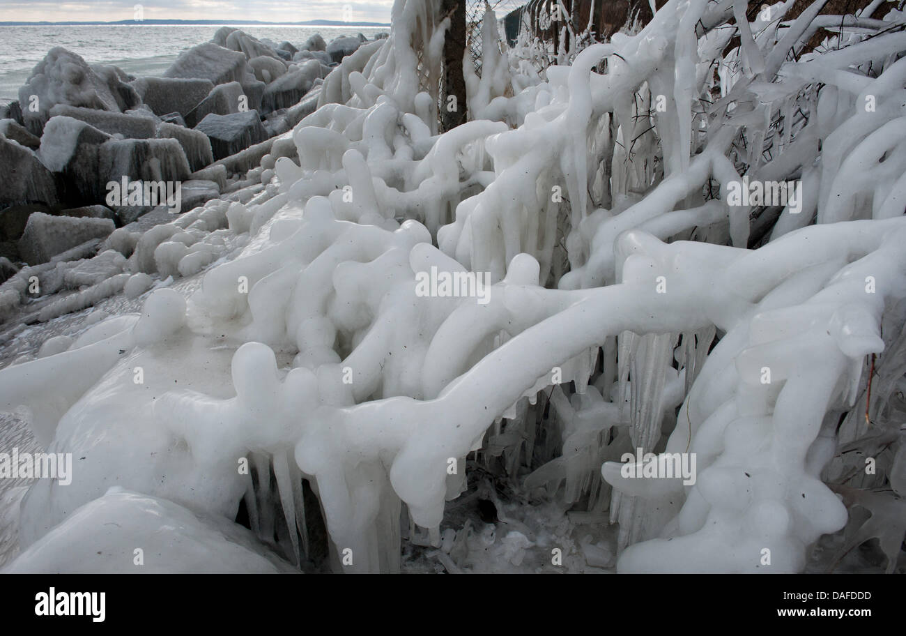 A mole is covered in ice and icicles in Sassnitz on the island of ...