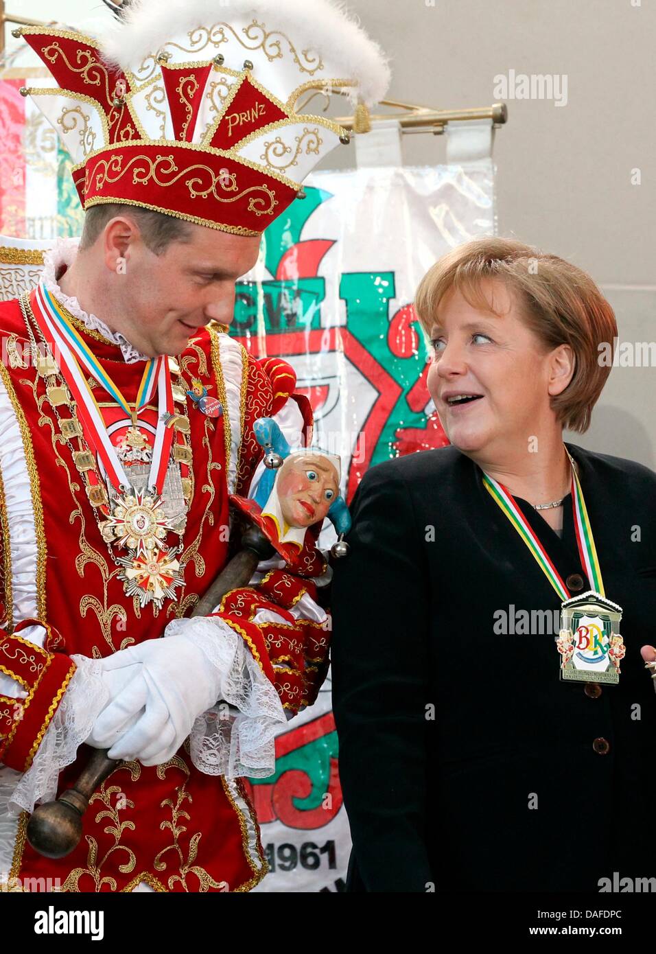 German Chancellor Angela Merkel (R, CDU) welcomes Carnival Prince ...