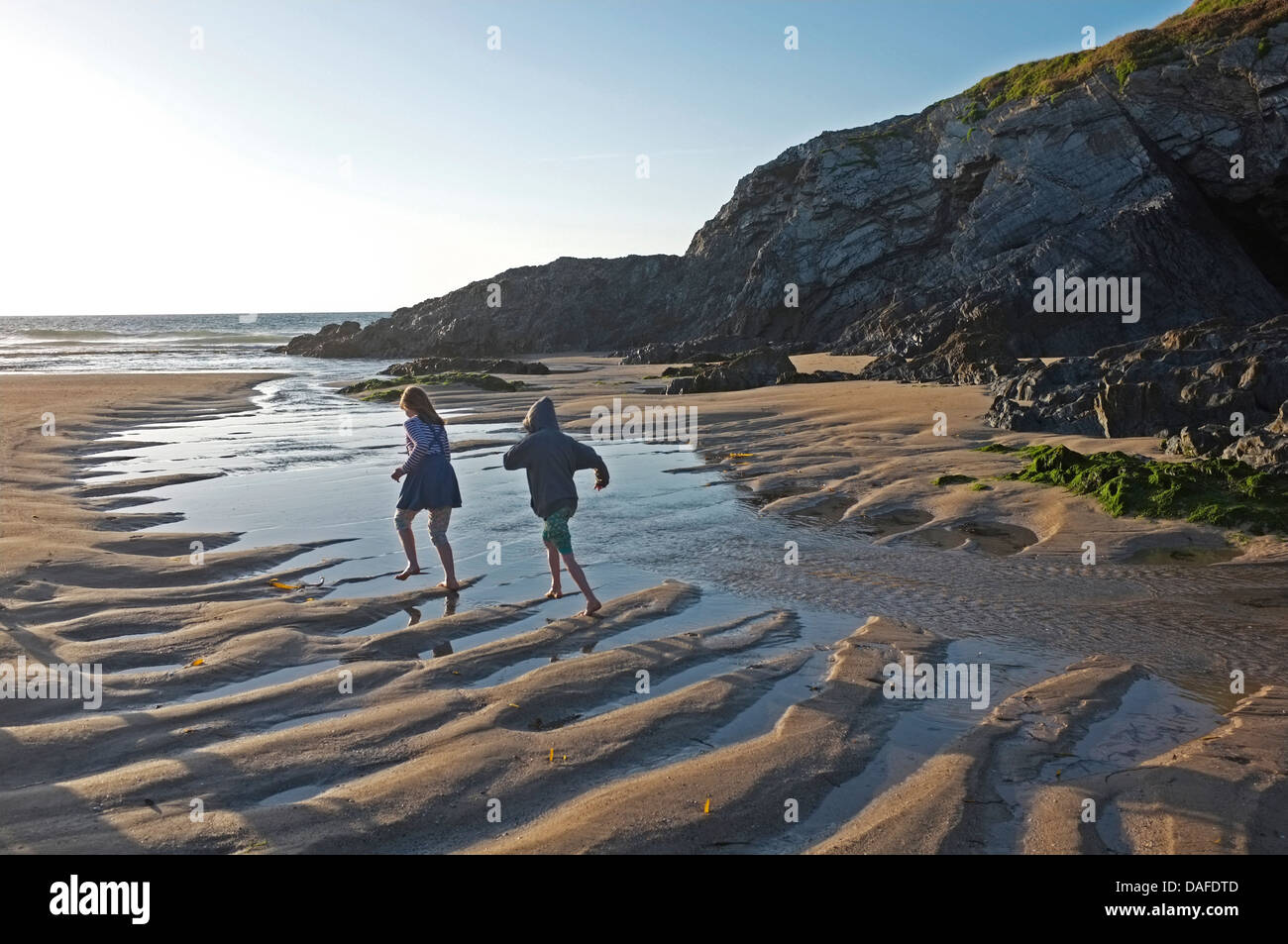 Girls running from water hi-res stock photography and images - Alamy