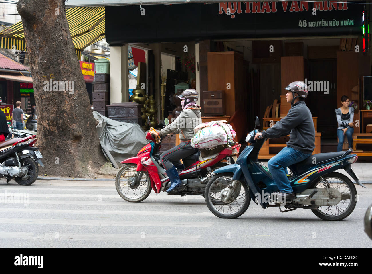Scooter Drivers in Hanoi, Vietnam Stock Photo - Alamy