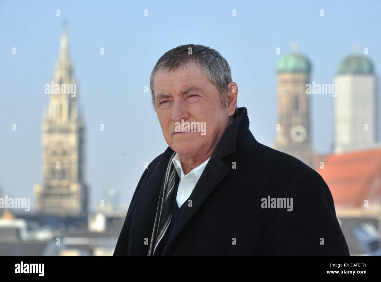 British actor John Nettles poses with a beer during a photo call in ...