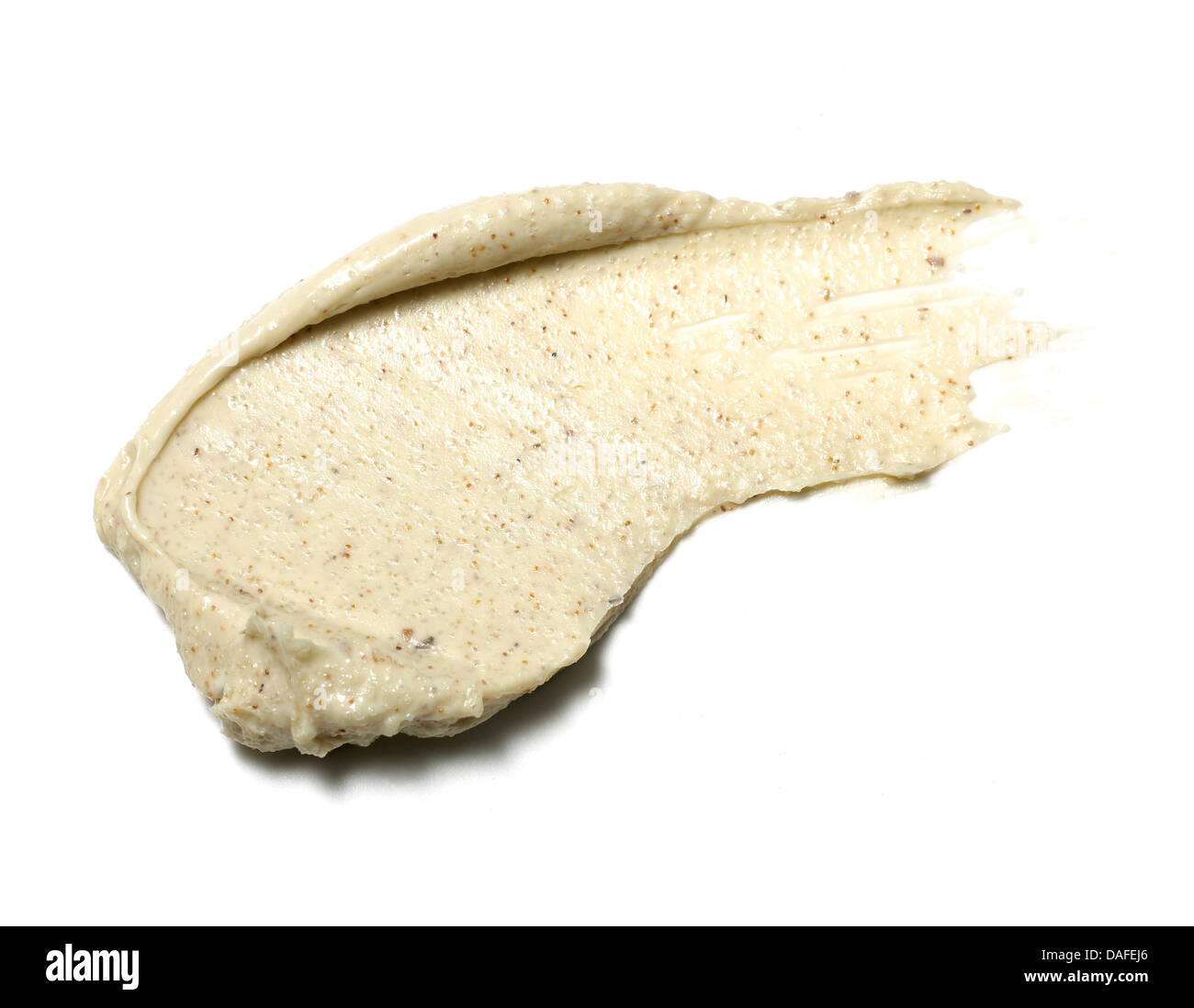 beige yellow body scrub paste cut out onto a white background Stock ...
