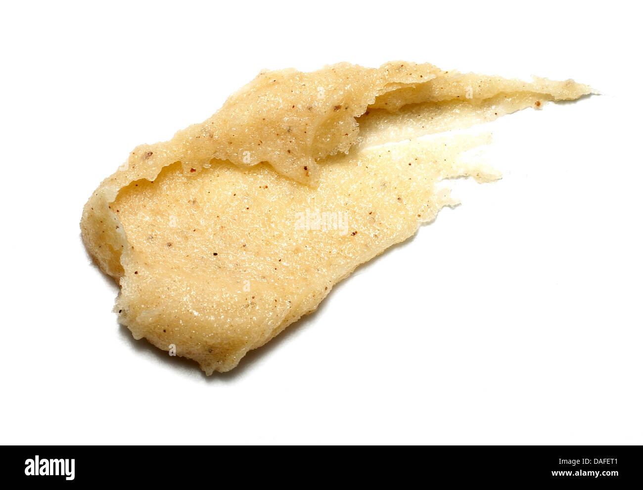 beige yellow body scrub paste cut out onto a white background Stock ...