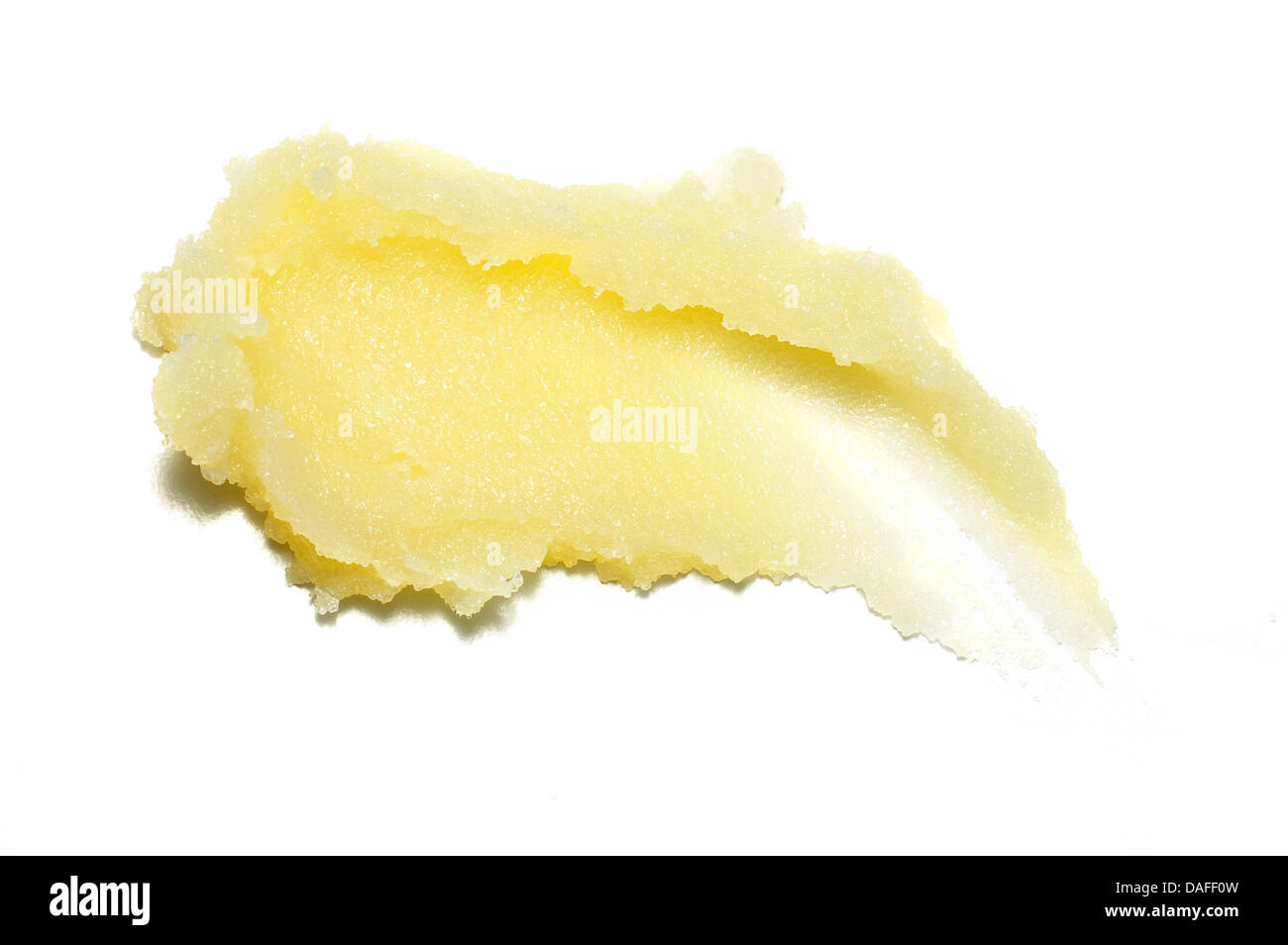 beige yellow body scrub paste cut out onto a white background Stock ...