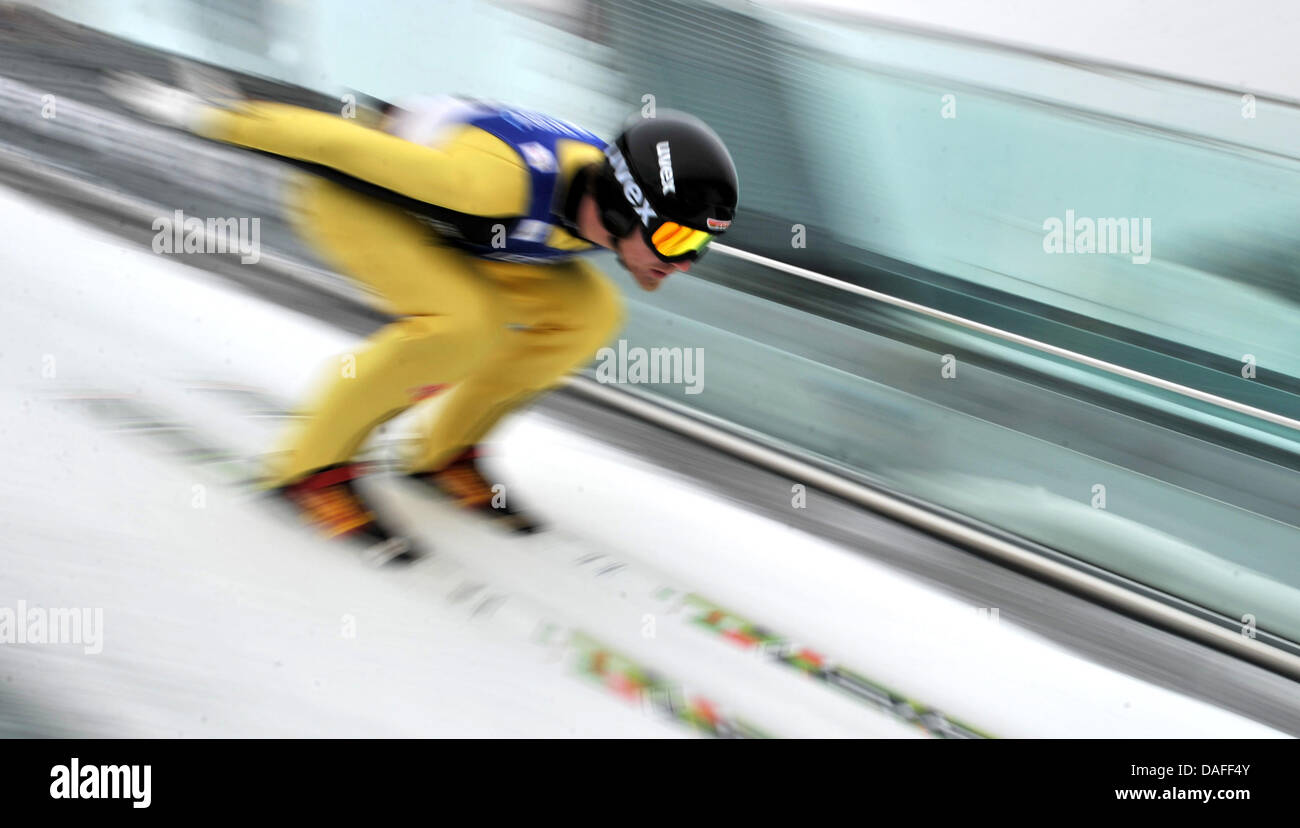 Christian Beetz of Germany heads down during the Ski Jumping training ...