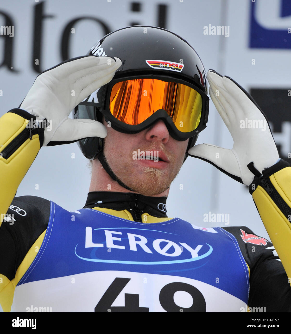 Christian Beetz of Germany prepares for a jump during the Ski Jumping ...