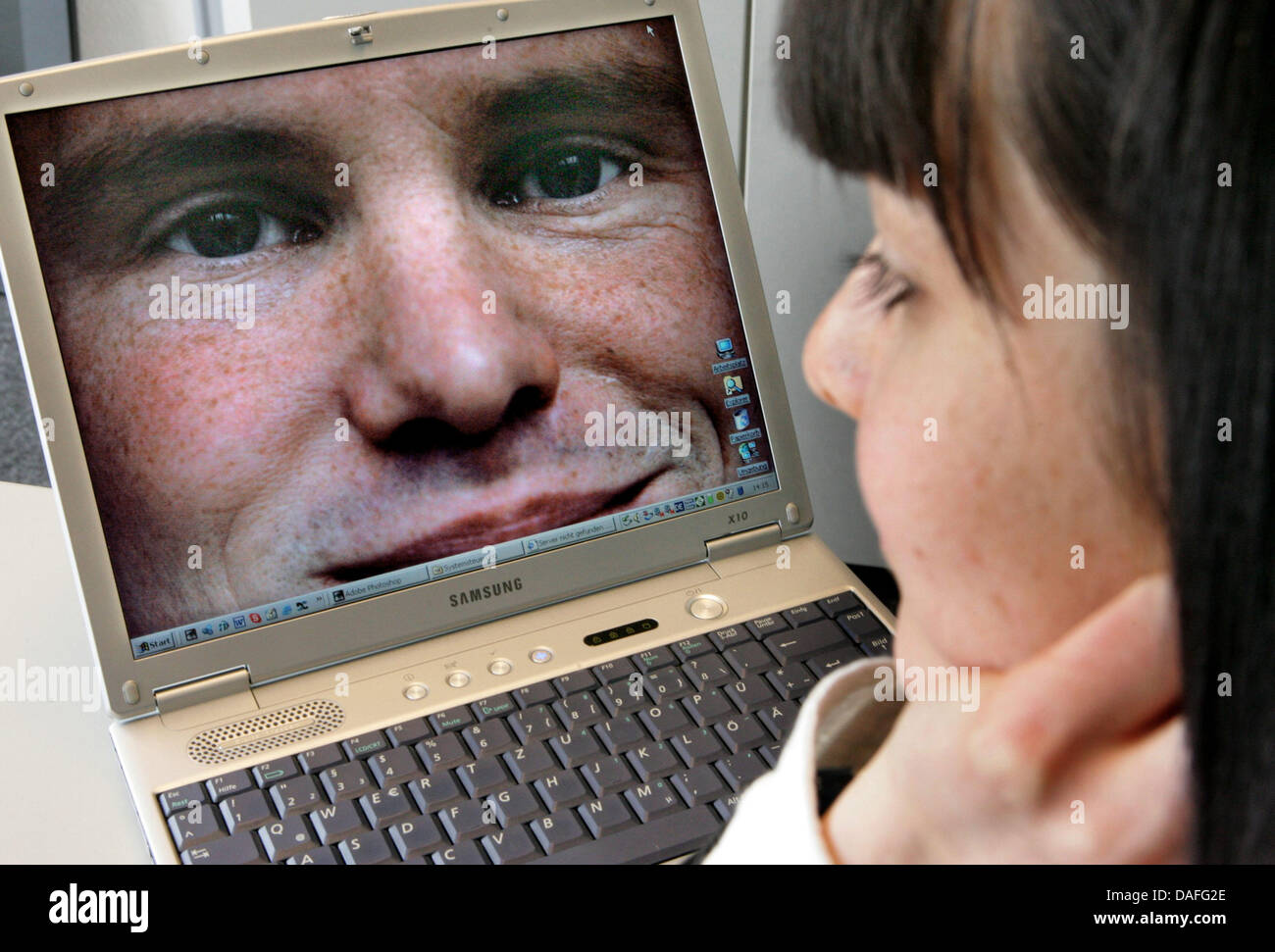 A file picture shows the face of a young man on the computer screen of ...