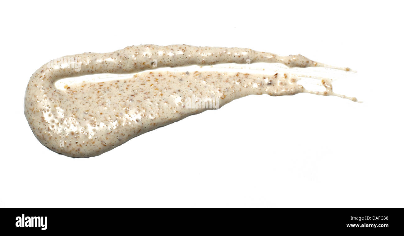 beige yellow body scrub paste cut out onto a white background Stock ...