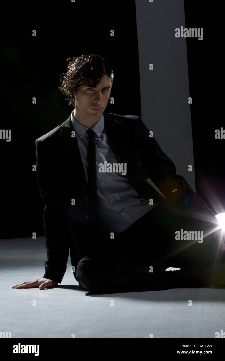Actor sitting, protrait Stock Photo - Alamy