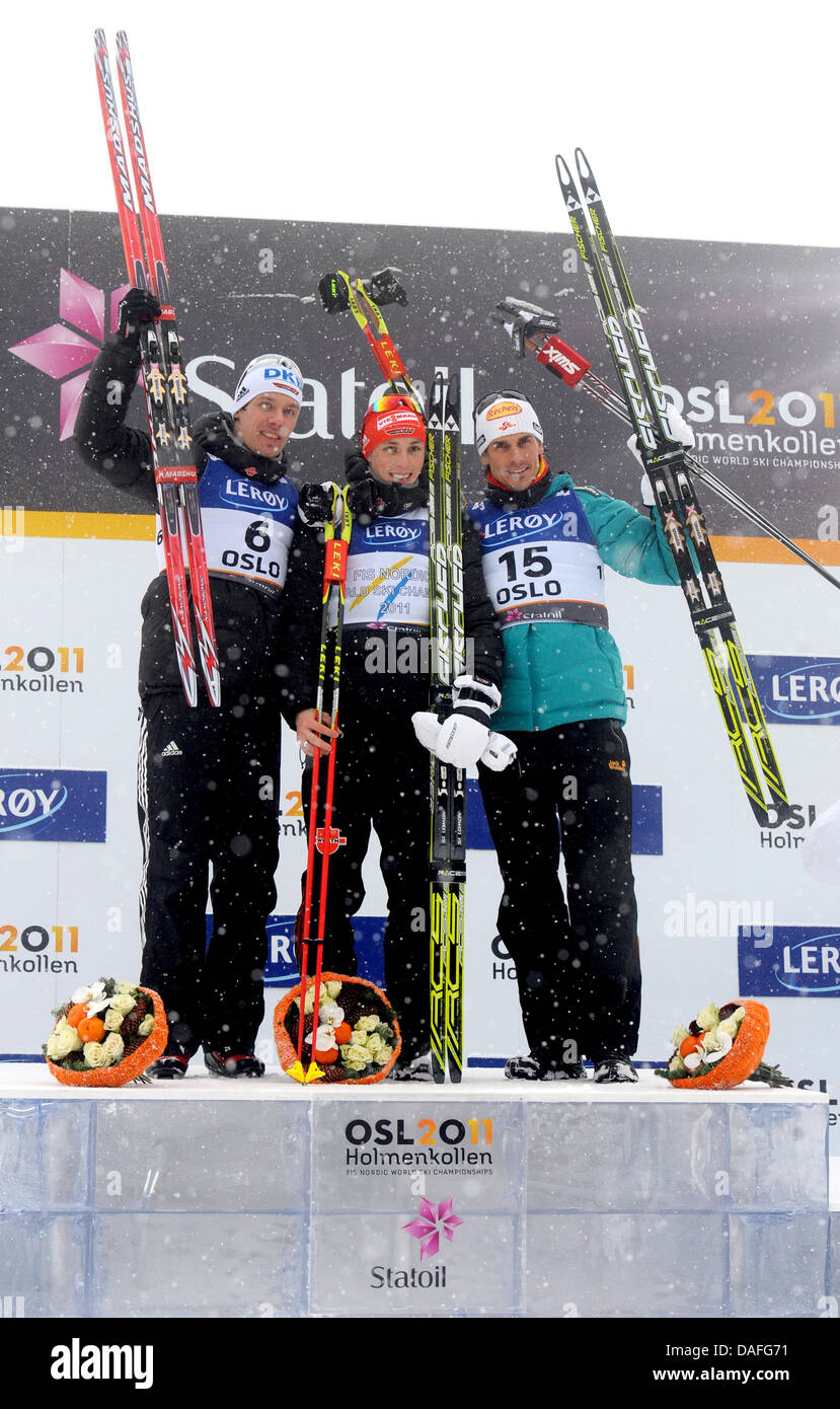 Second placed Tino Edelmann, winner Eric Frenzel of Germany and third ...