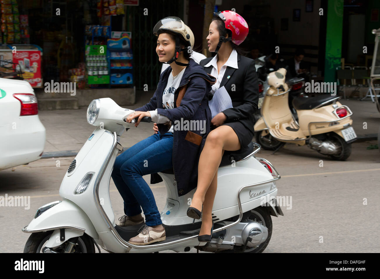 Scooter Drivers in Hanoi, Vietnam Stock Photo - Alamy