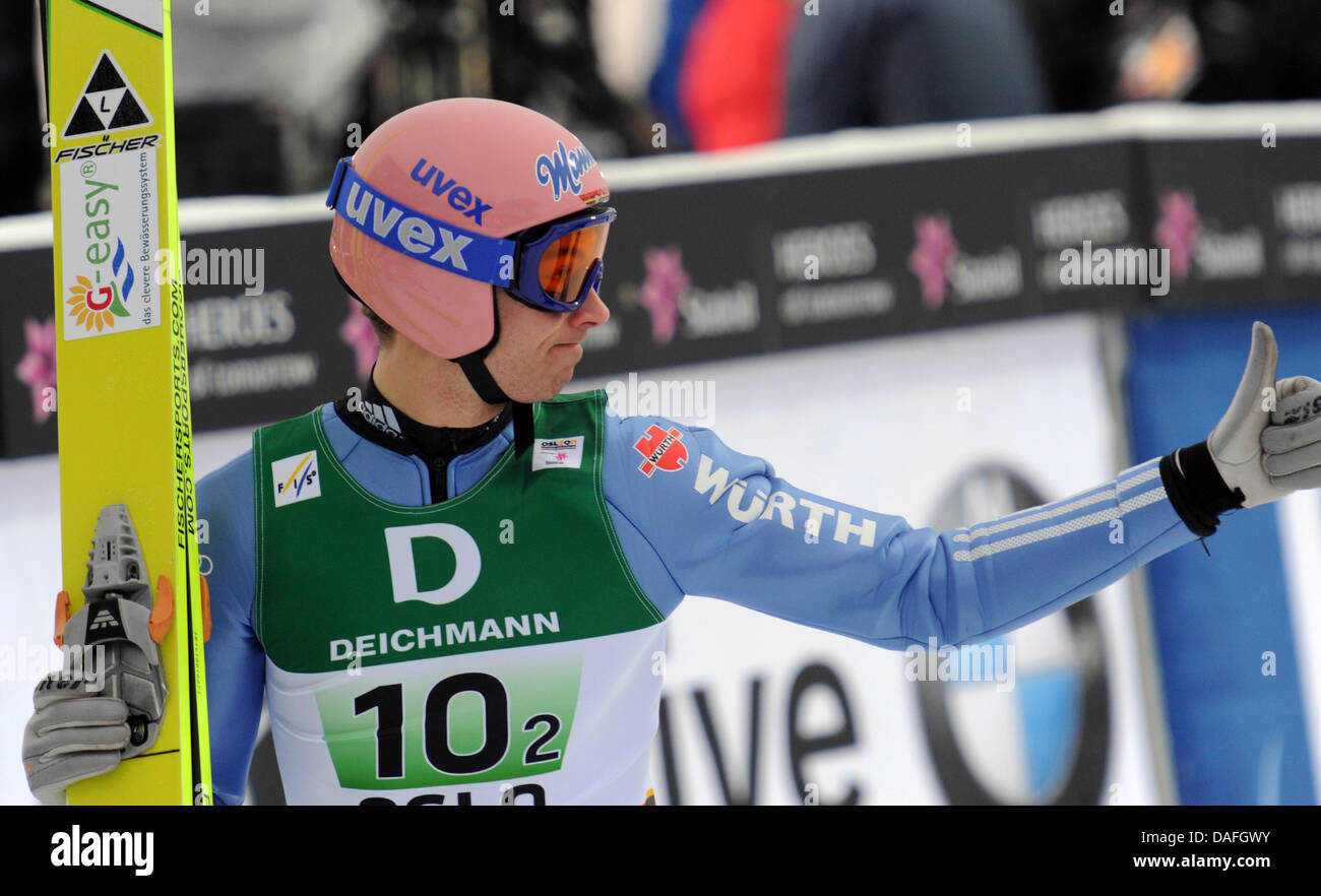 Michael Neumayer from Germany reacts after the Men's Ski Jump Normal ...