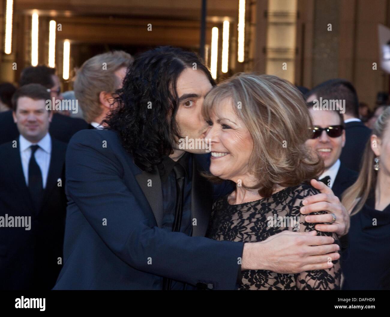 English comedian Russell Brand and his mother Barbara Elizabeth arrive ...