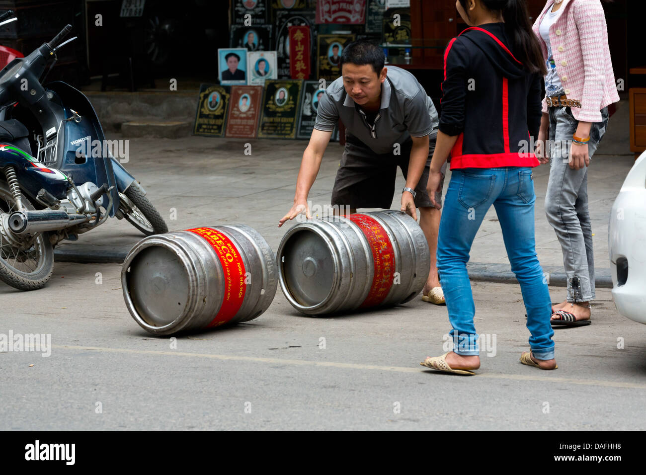Man moving barrels hi-res stock photography and images - Alamy