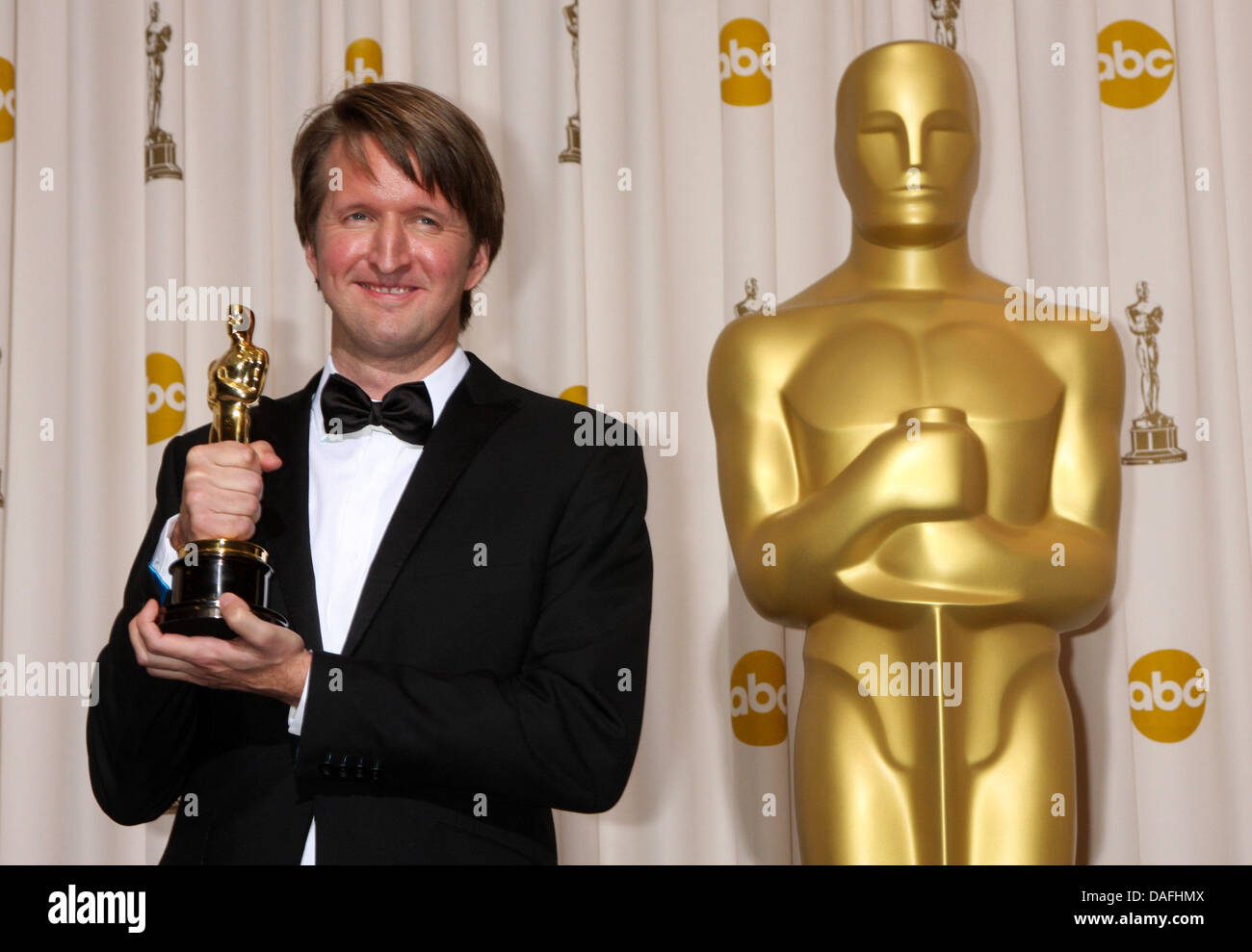 British director Tom Hooper poses with his Oscar for 'Directing' in the ...