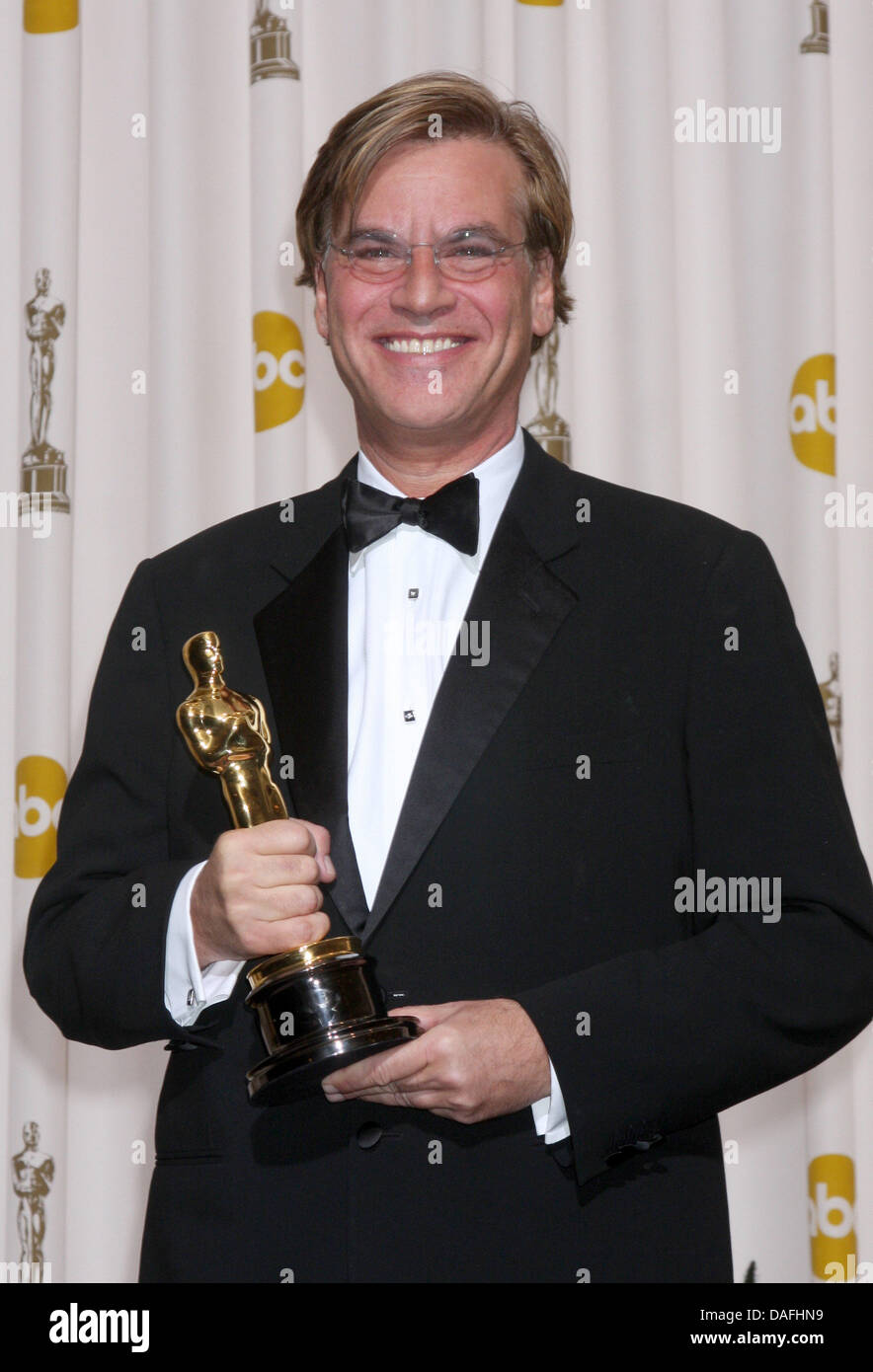 US writer Aaron Sorkin ('The Social Network') poses with his Oscar for ...
