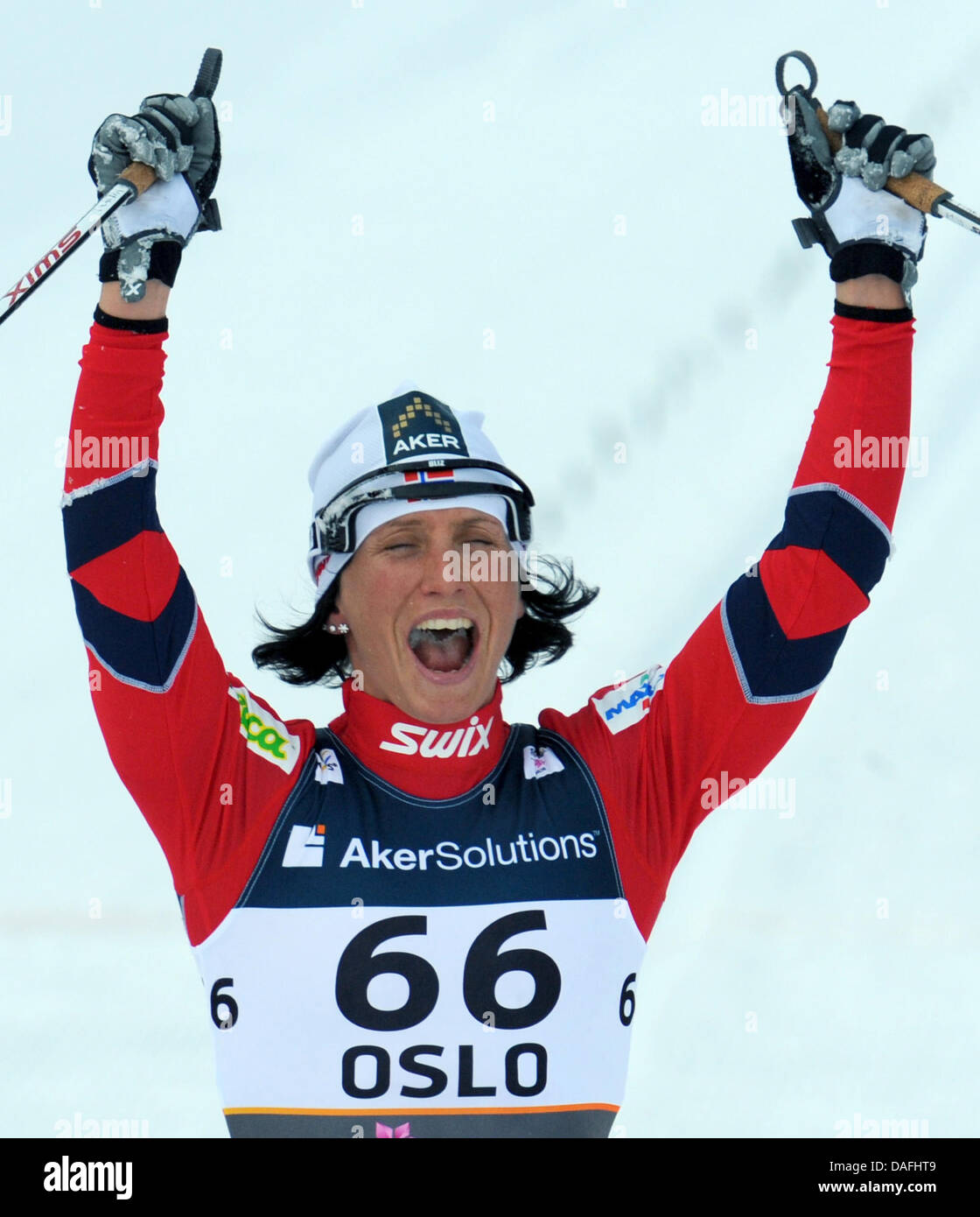 Winner Marit Bjorgen from Norway celebrates winning the women's 10 km ...