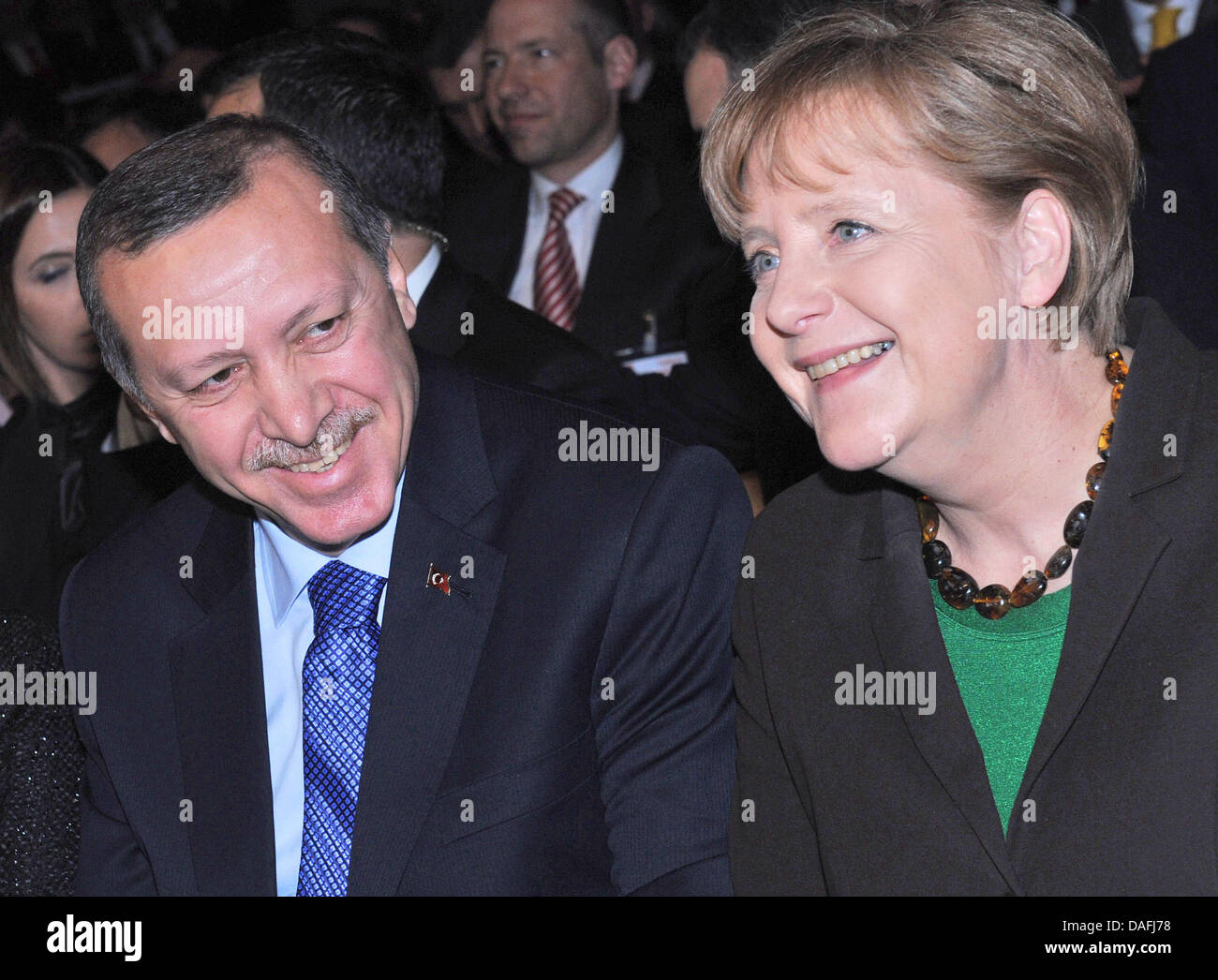 German Chancellor Angela Merkel and Turkish Prime Minister Recep Tayyip ...