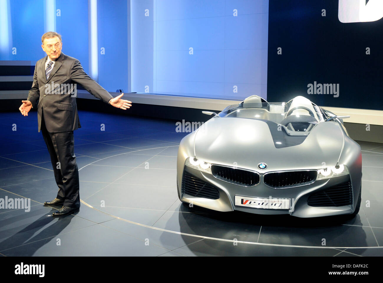 BMW CEO Norbert Reithofer poses with the German carmaker's study BMW ...