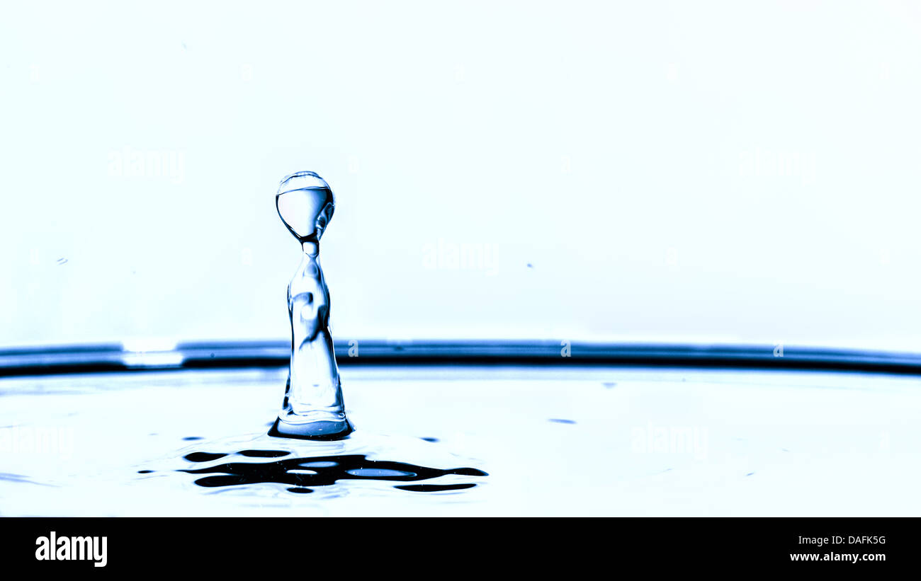 A beautiful shape created by the fluid motion of water splashing as it ...